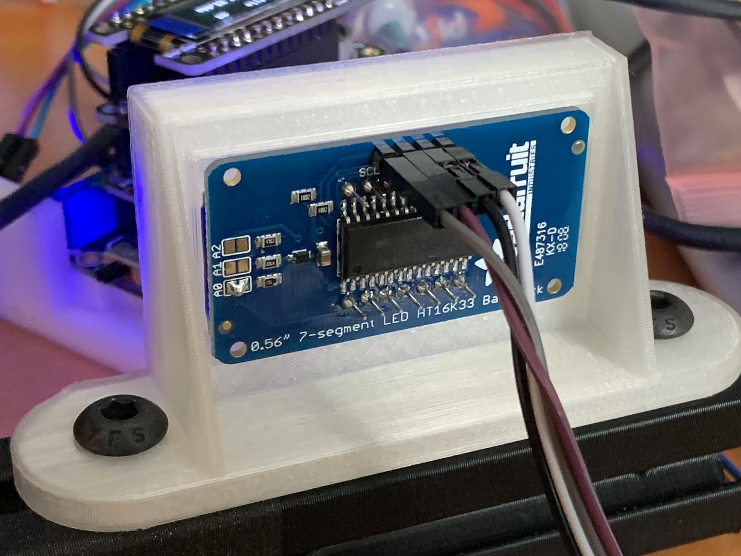 A four digit, seven segment led display holder for an 8020 series 10 ...