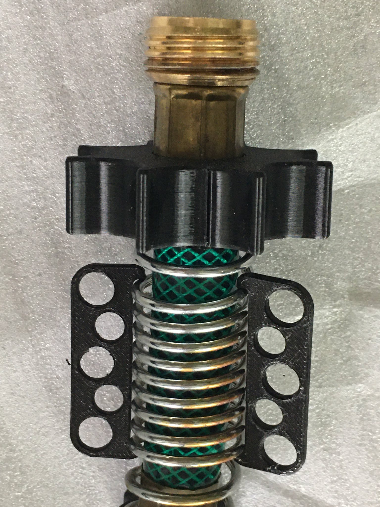 Solid Coil Spring compressor for installation of garden hose handle on ...