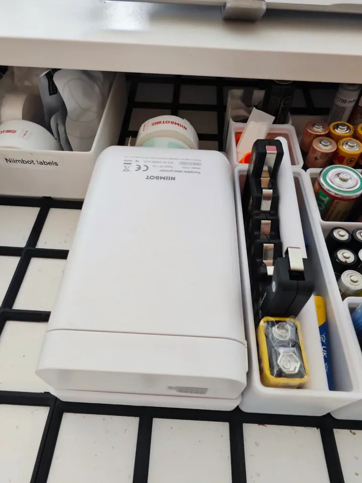 Gridfinity Niimbot D101 holder by joazito | Download free STL model ...