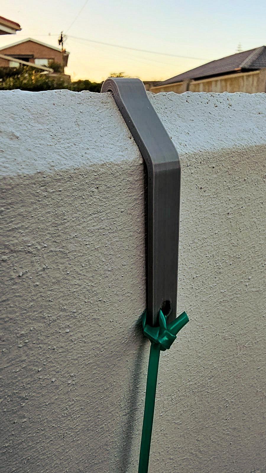 Hooks for training plants against a precast concrete wall by NelisW ...