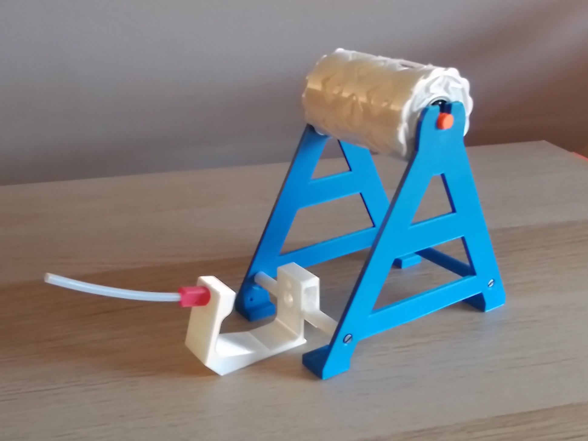 Integrated Auto-Rewinder for Spool Holder - supplemented output by ...