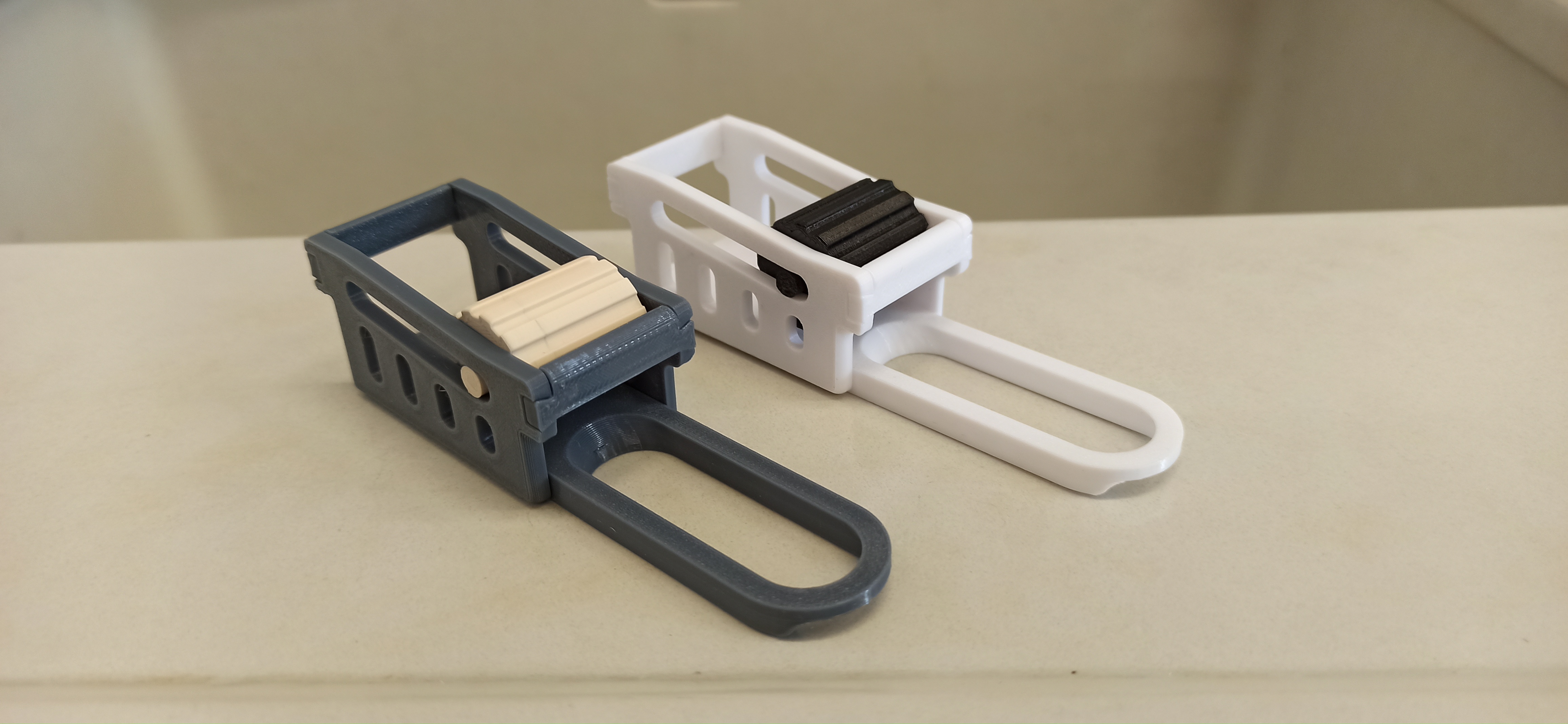 Roller Clamp - One-handed operation and flow control by Dario A. R ...