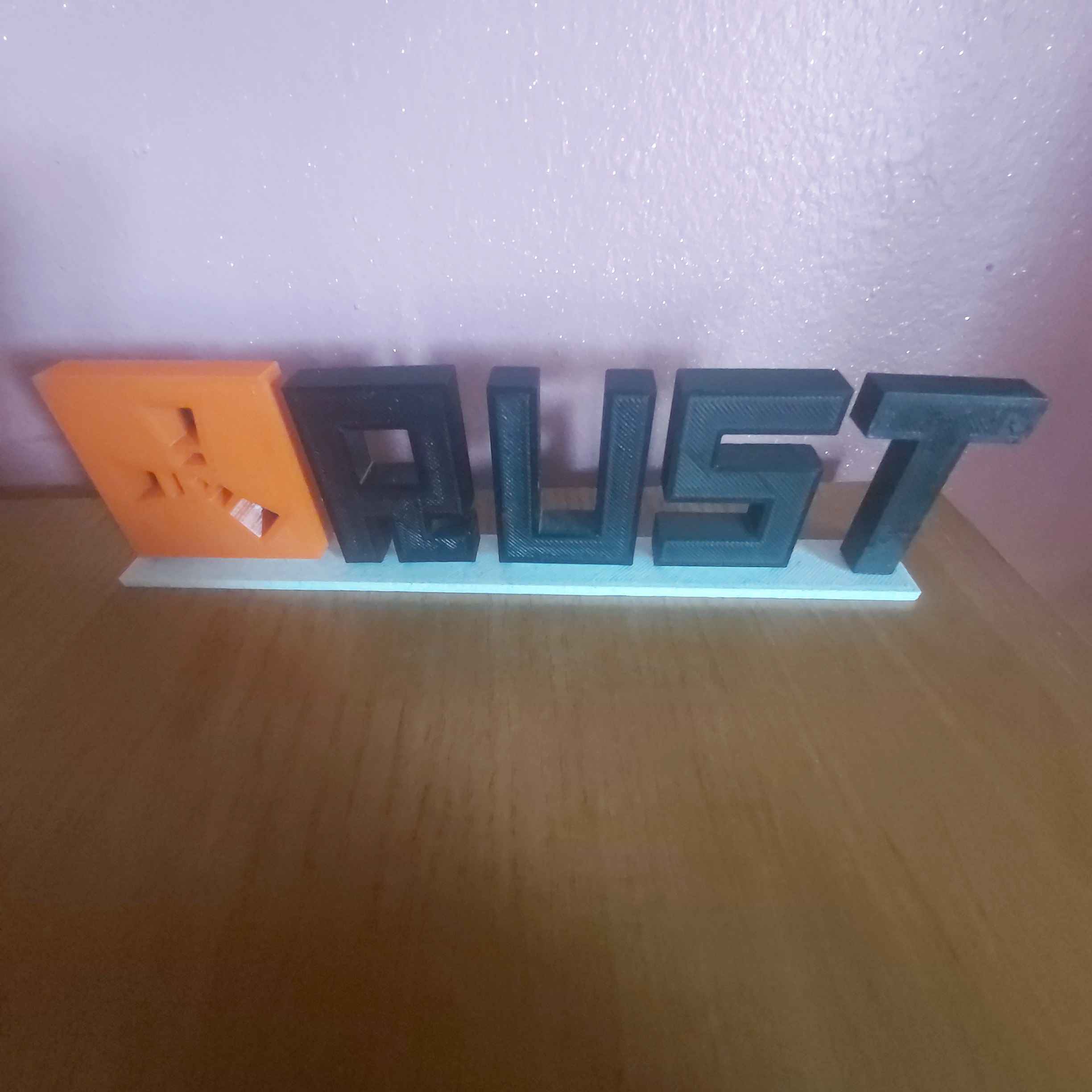 Rust logo on holder by Baaalzy | Download free STL model | Printables.com