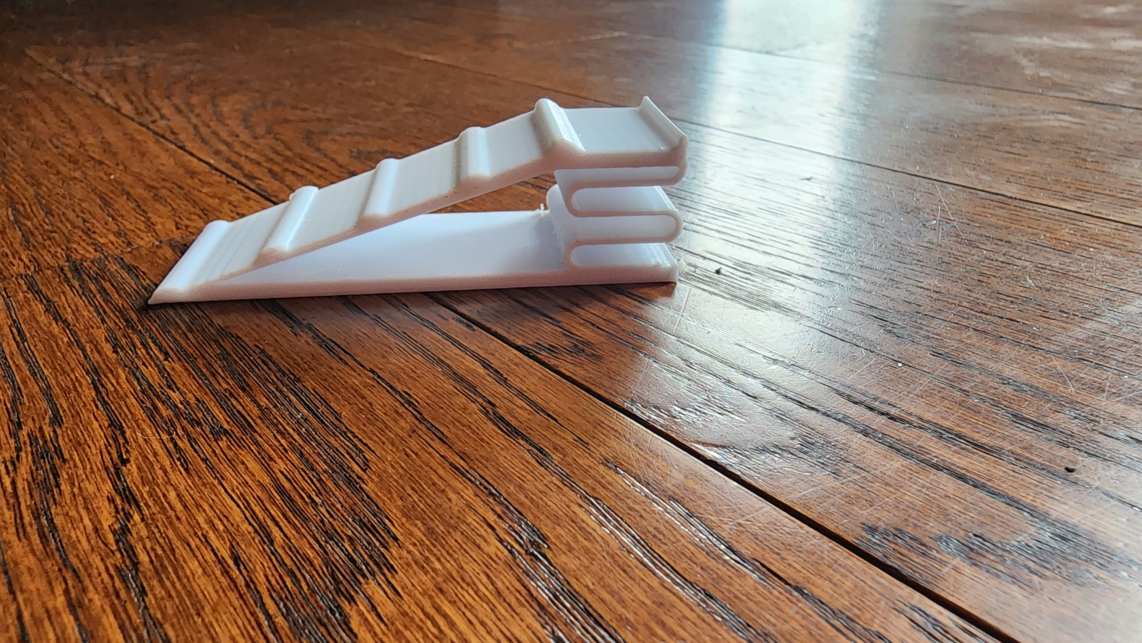 Spring Loaded Door Stop by klypt - MakerWorld