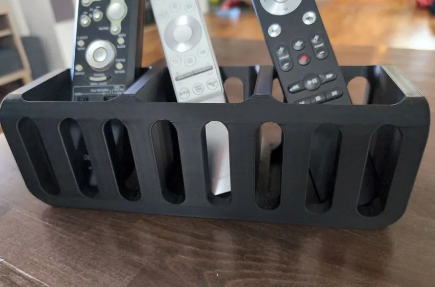 Modern Remote Control Holder by Deltaprints | Download free STL model ...