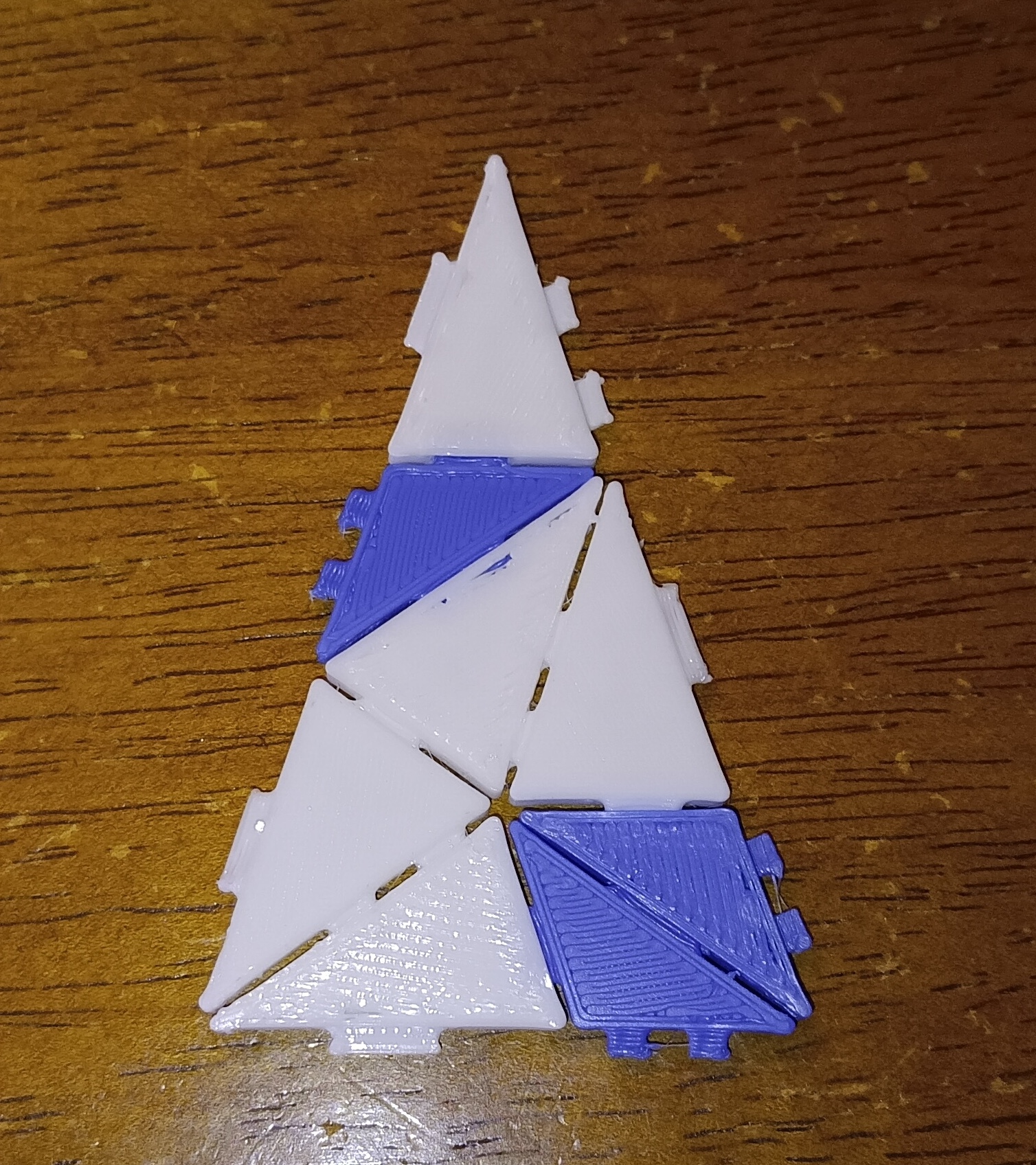 Penrose tiling based on flippable triangles with hidden tabs by Paul ...