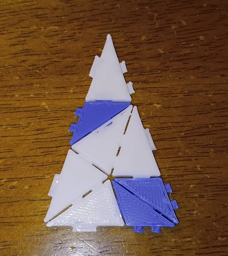 Penrose tiling based on flippable triangles with hidden tabs by Paul ...