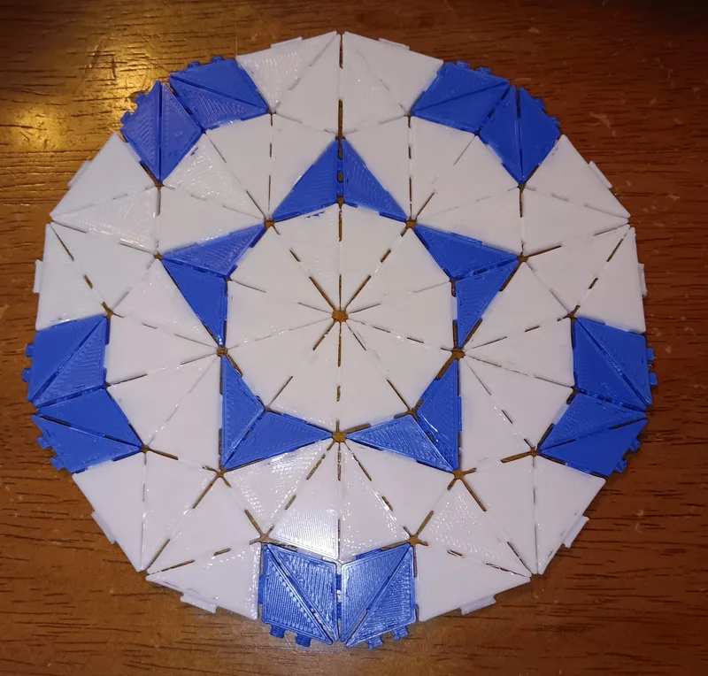 Penrose tiling based on flippable triangles with hidden tabs by Paul ...