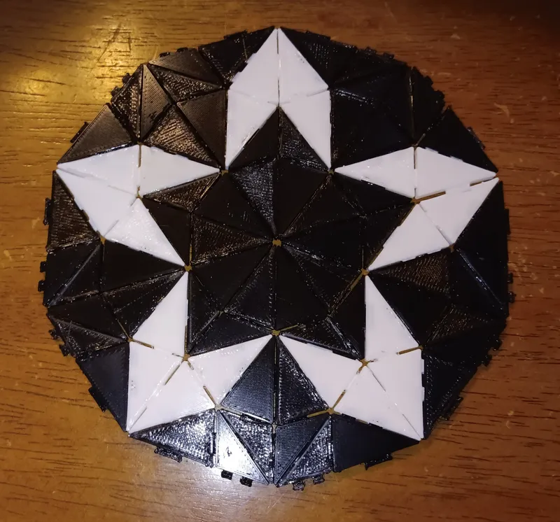 Penrose tiling based on flippable triangles with hidden tabs by Paul ...