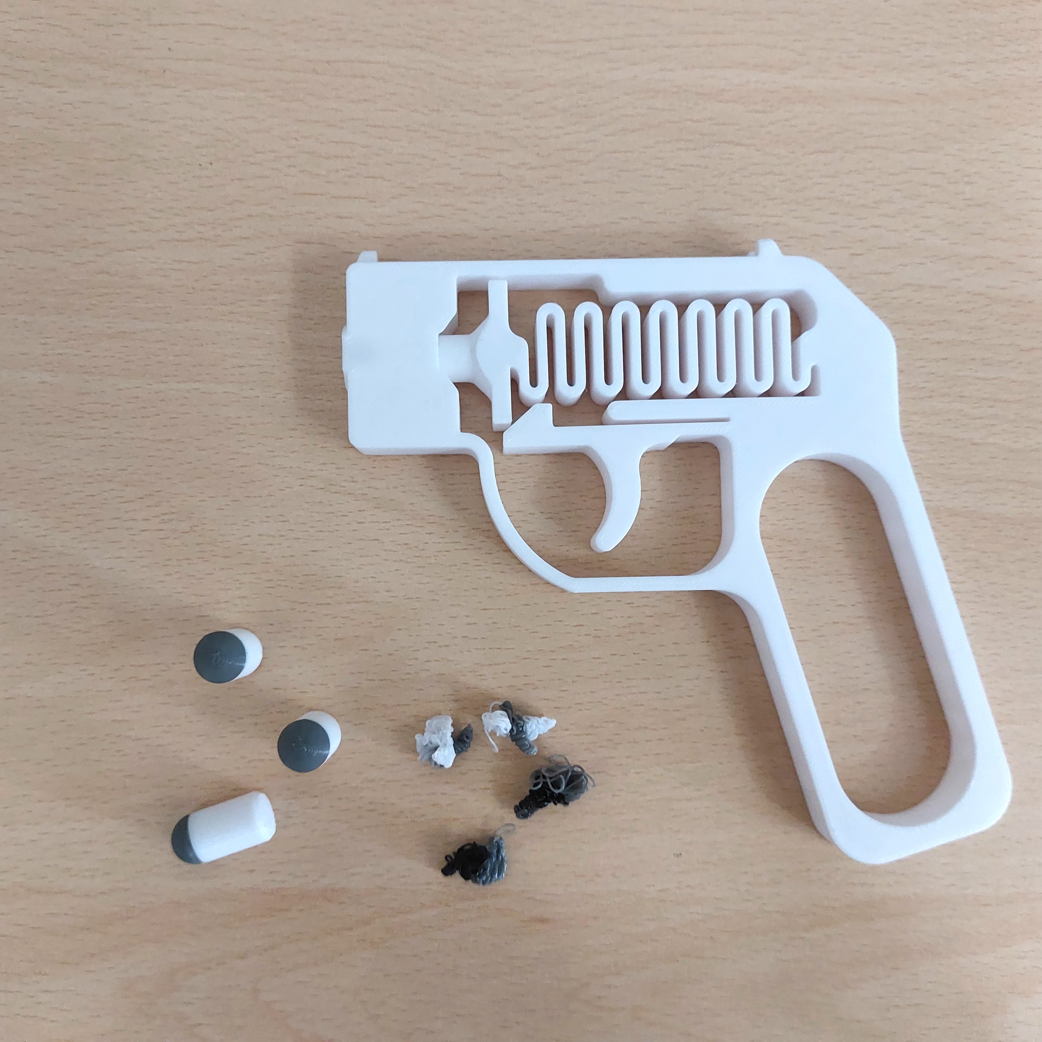Spring Gun - Shoots fake bullets and poop by Next3D | Download free STL ...