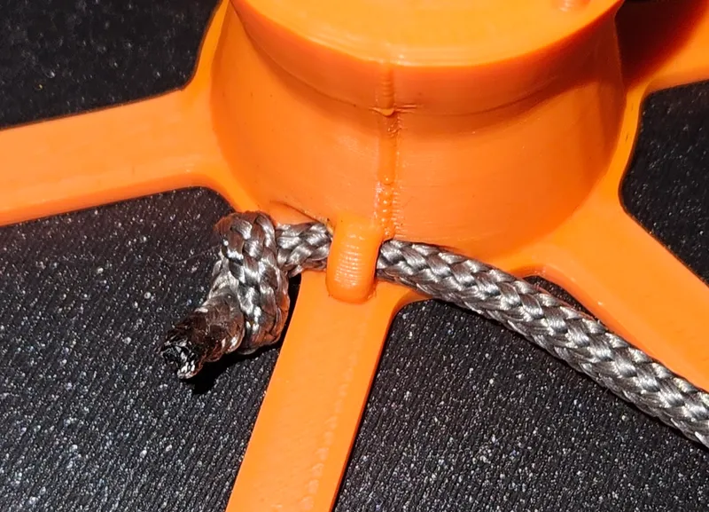 Retractable and locking paracord spool with built-in storage for ...