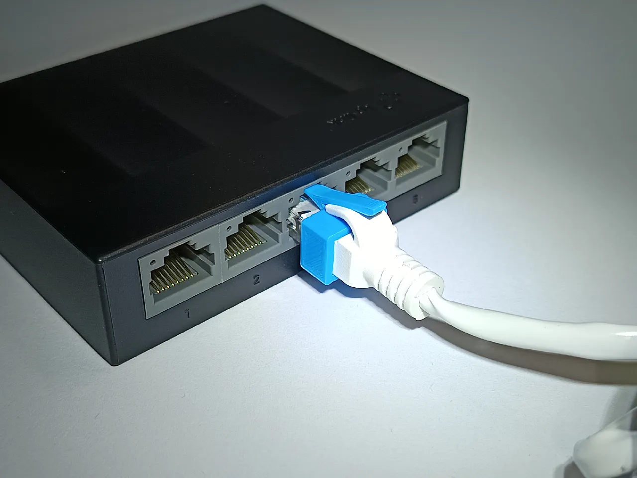 Ethernet LAN RJ45 cable plug locking clip repair by konradmb | Download ...